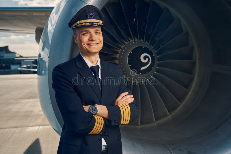 Cheerful Aviator Posing for the Camera after the Flight Stock Photo ...