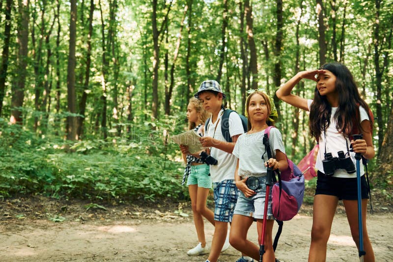 Front View. Kids Strolling in the Forest with Travel Equipment Stock ...