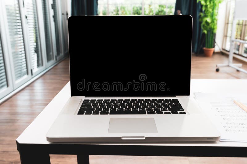 Front View of the Laptop is on the Work Table in Meeting Room Stock ...