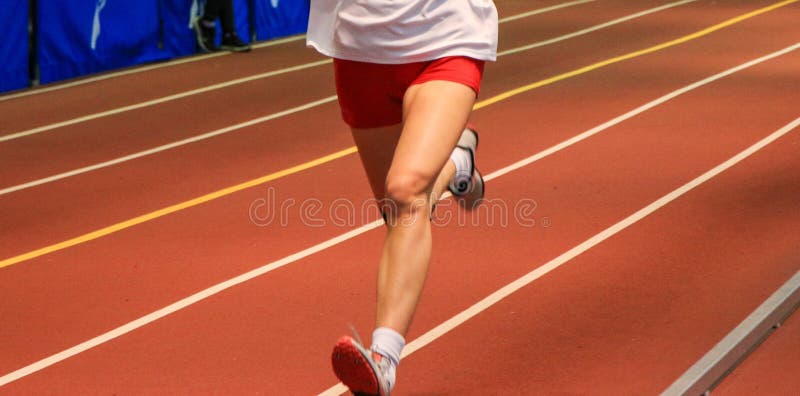 Legs of a Runner on an Indoor Track Stock Image - Image of school, girl ...