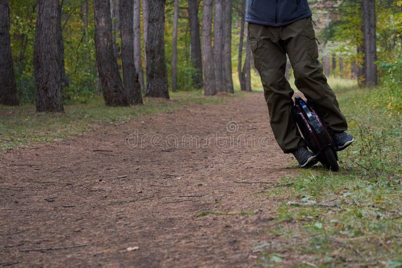 Front View of Male Legs on a Unicycle in the Forest Stock Image - Image ...