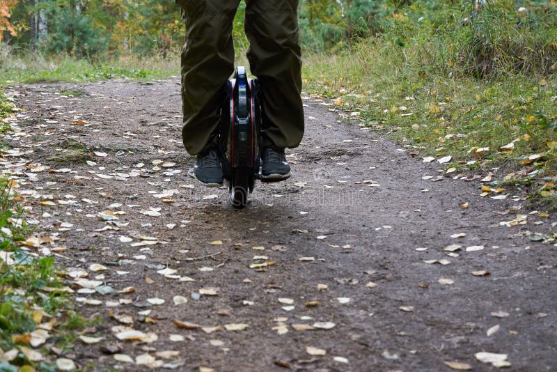 Front View of Male Legs on a Unicycle in the Forest Stock Image - Image ...