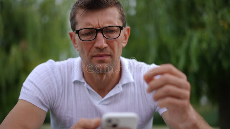 Front View Man Making Surprised and Troubled Facial Expression Reading ...