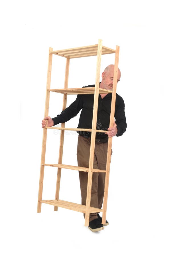 Two Men Carrying Shelf stock photo. Image of furniture - 222462788