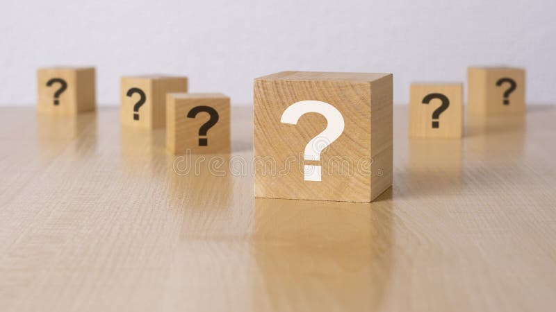 Front View on Many Wood Cubes with Question Marks. Many Question ...