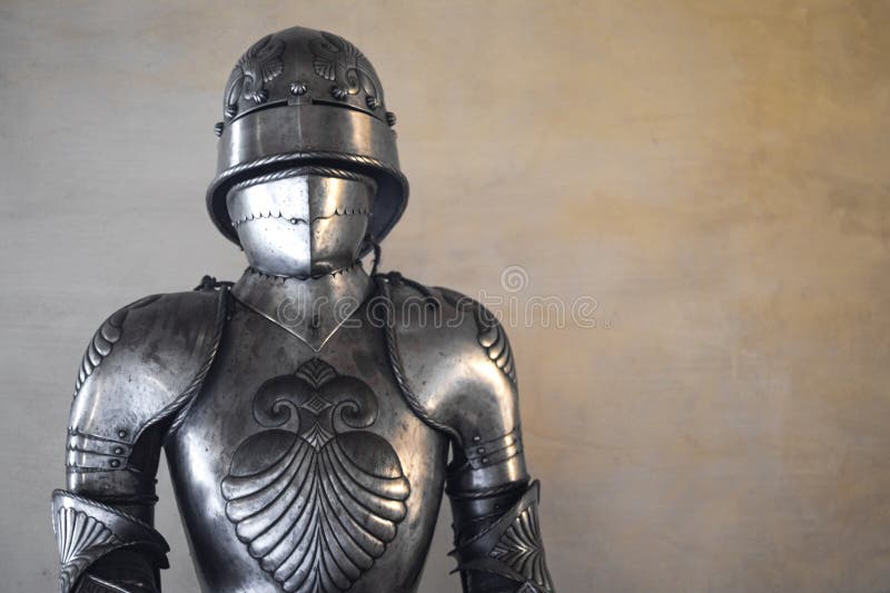 Front View of Medieval Shiny Armor with Details and White Wall in ...
