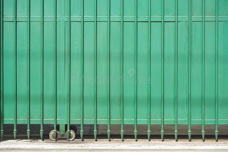 Front View of Metal Green Automatic Sliding Gate Door with Spike ...