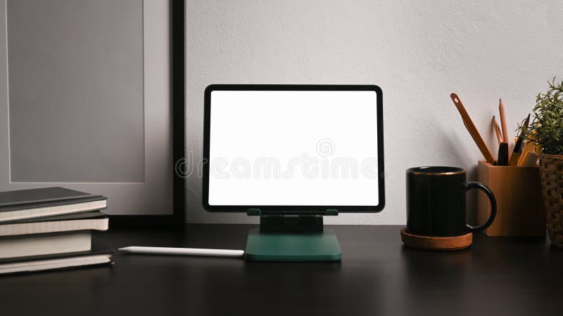 Front View Digital Table with Blank Screen on Black Wooden Table. Stock ...