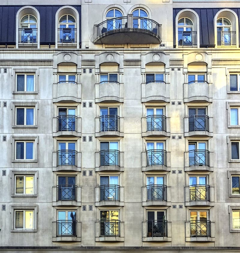 Front View of Modern Residential Building with Many Sunlit Windows ...