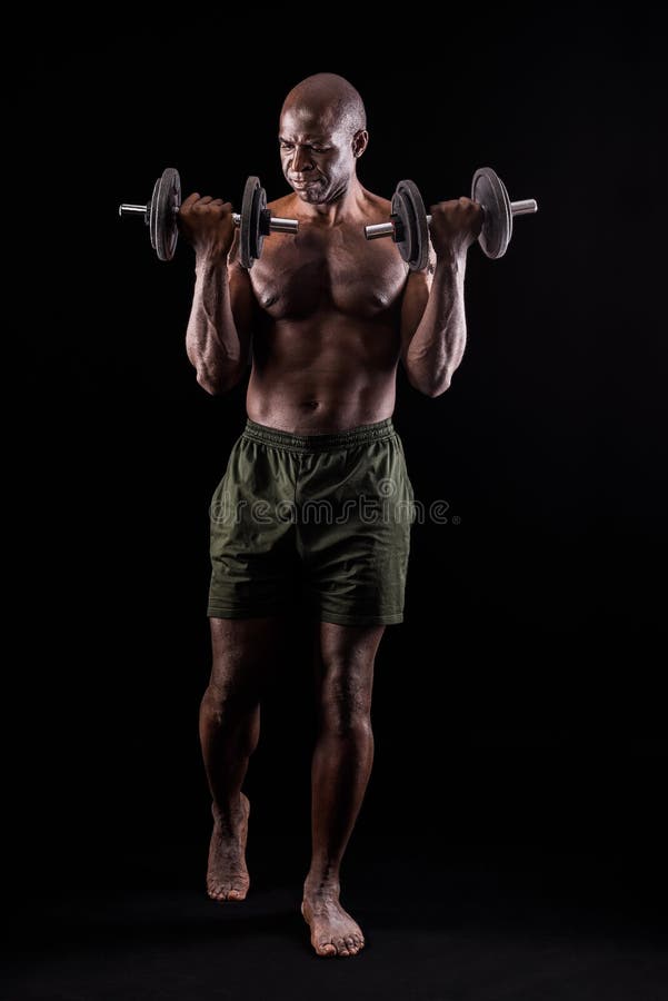 Front View of a Muscular Man Standing Doing Exercise for Biceps Stock ...