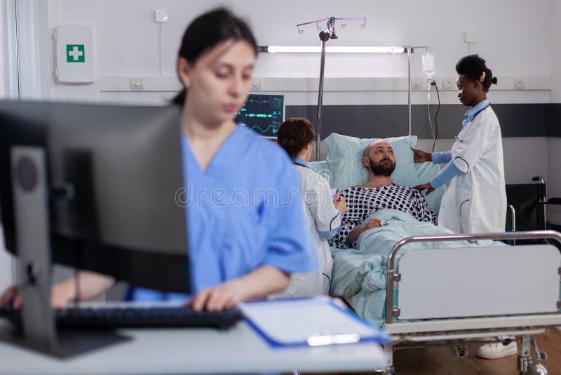 Front View of Nurse Typing Medical Expertise on Computer Stock Photo ...