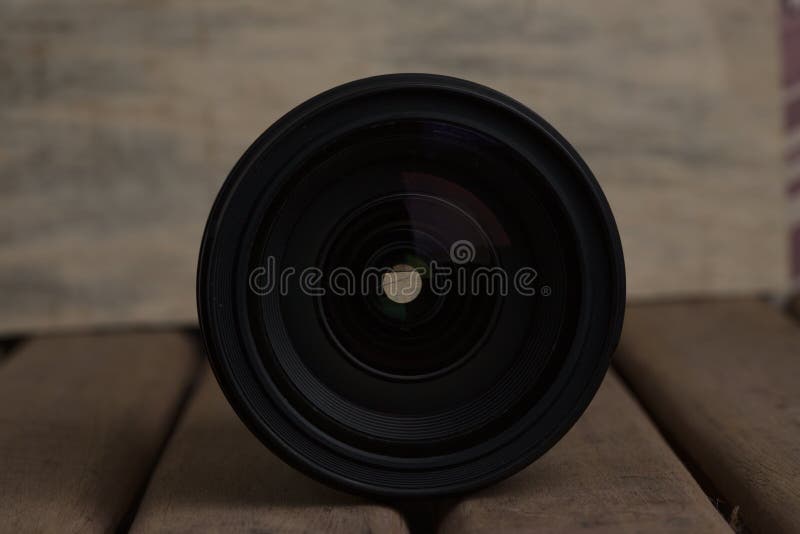 Front View of an Objective Camera Lens Stock Image - Image of wooden ...