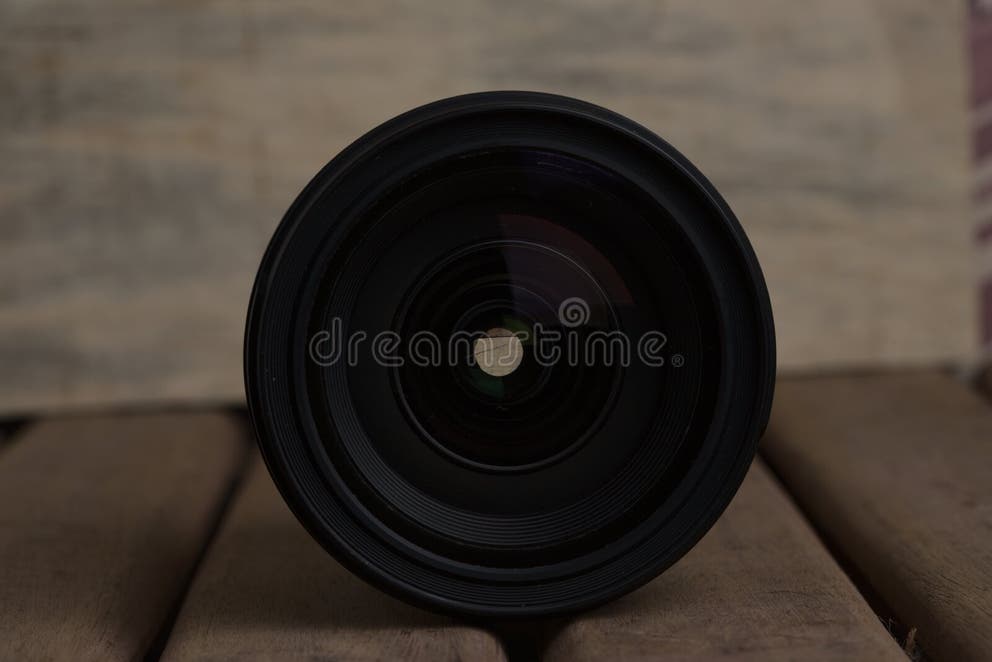 Front View of an Objective Camera Lens Stock Image - Image of wooden ...