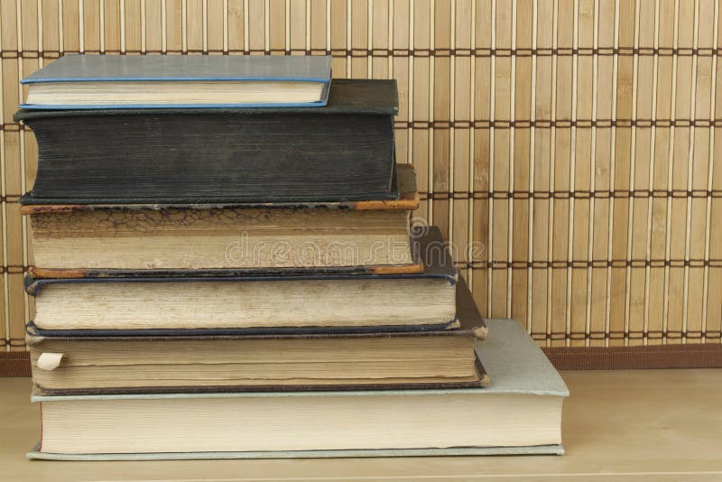 Front View of Old Books Stacked on a Shelf. Stock Photo - Image of ...