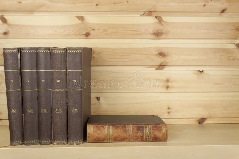 Front View of Old Books Stacked on a Shelf. Stock Photo - Image of ...