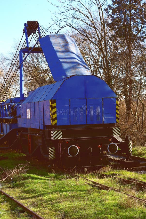 Front View, of an Old Train with a Locomotive and Track Overgrown Stock ...
