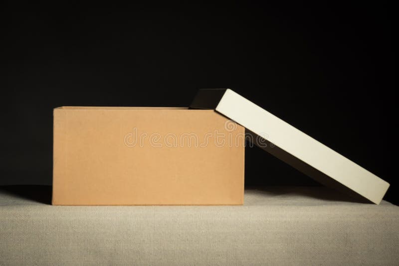 Front View on Open Brown Cardboard Box on Black Background, Copy Space ...