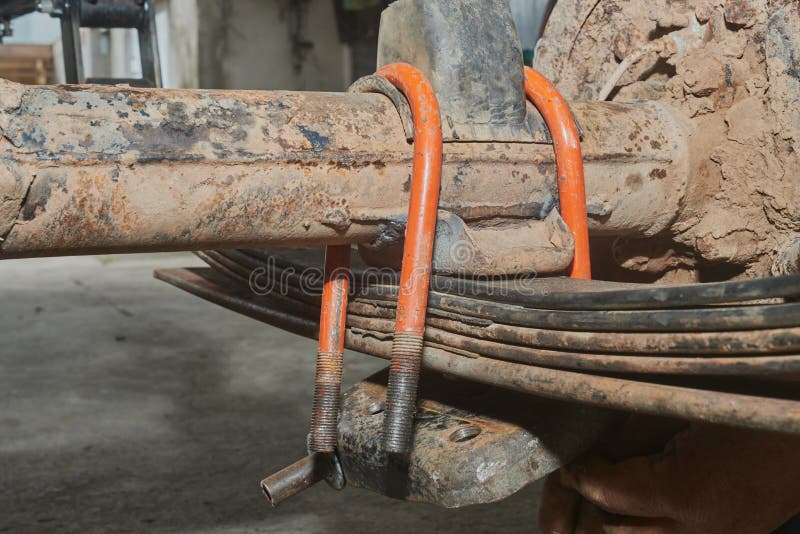 Front View Orange U-Bolt with Bump Stop on Rear Axle and Leaf Spring ...