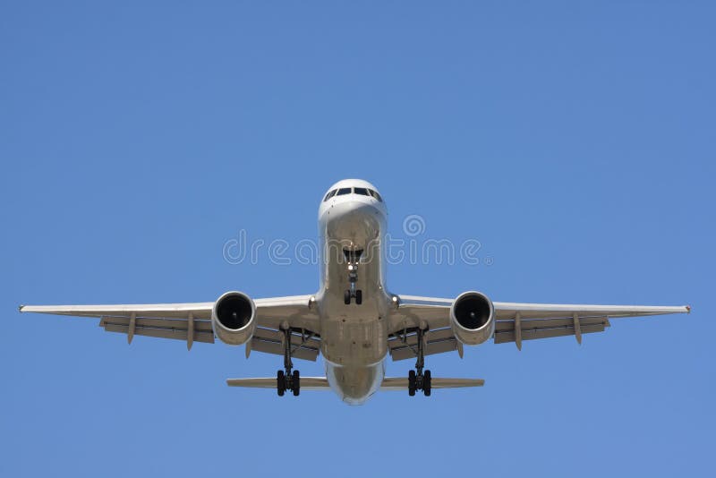 Front View of a Passanger Aircraft in Flight Stock Photo - Image of ...