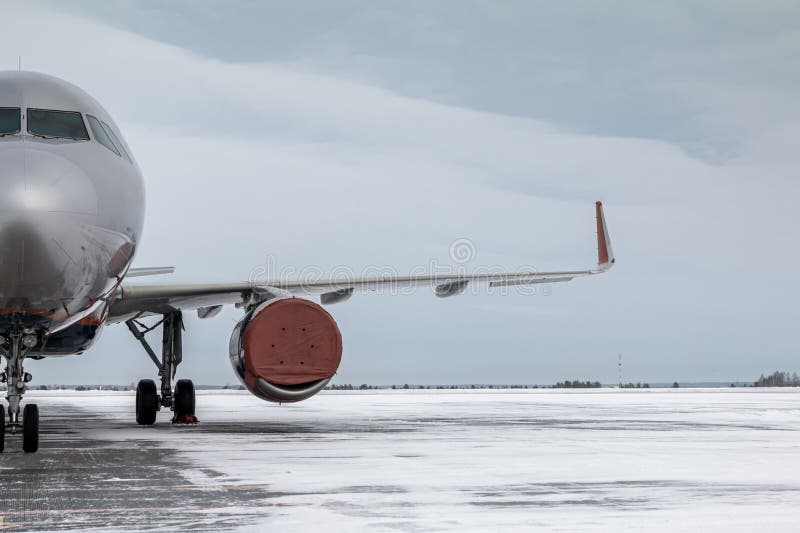 Front View of the Passenger Jet Plane on the Airport Apron at Winter ...