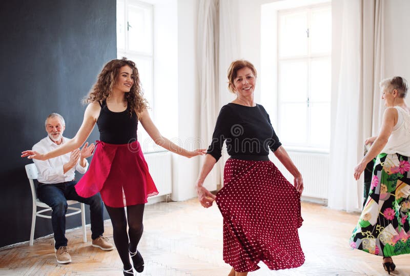 Portrait of Dance Teacher with Group of Seniors in Dancing Class. Stock ...