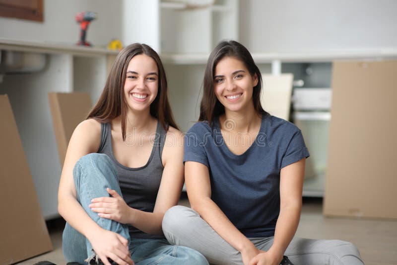 Happy Roommates Posing in a House Under Reformation Stock Image - Image ...