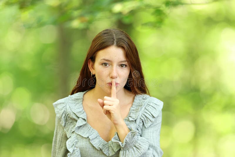 Woman is Asking for Silence in a Forest Stock Image - Image of colorful ...