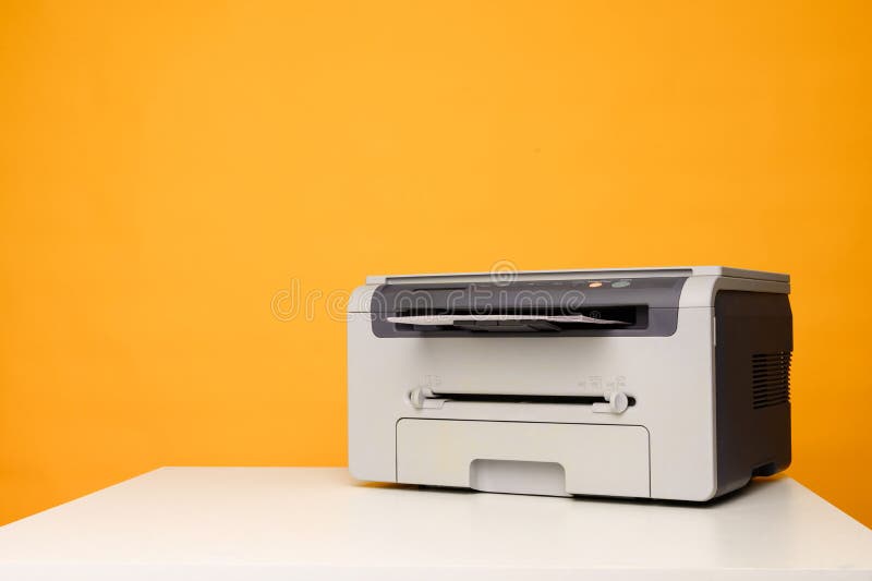 Front View of a Printer and a Blank Sheet of A4 Paper on a Blue ...