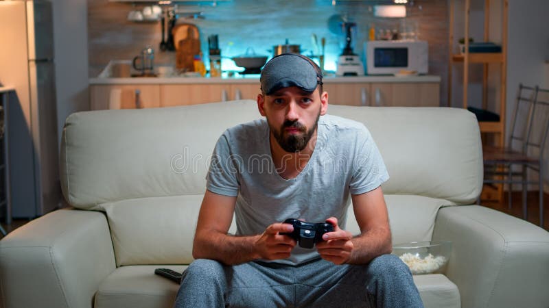 Gamer Sitting on Couch with Controller Stock Photo - Image of amusemant ...