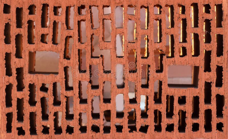 Front View of Red Brick with Holes Stock Photo - Image of orange ...