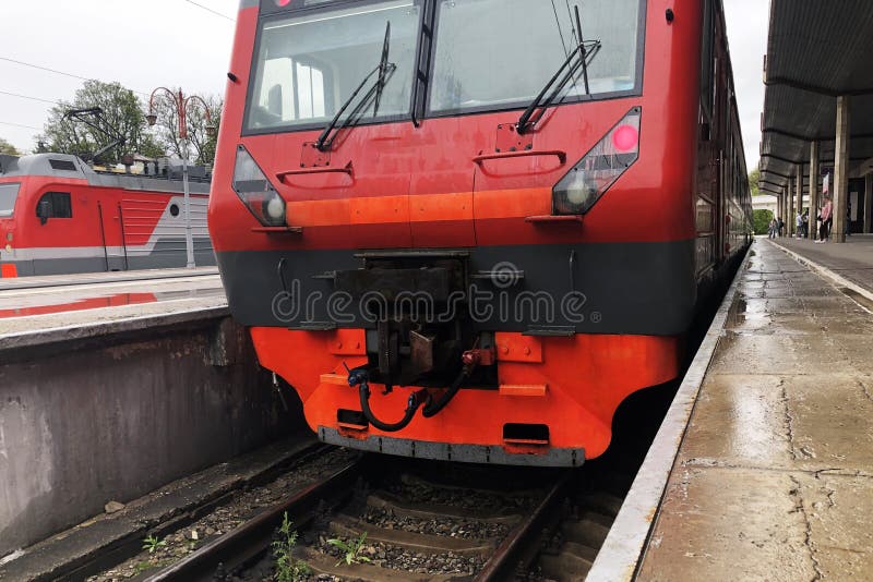 Front View of Red Train Standing on Platform on Railway Station Ready ...