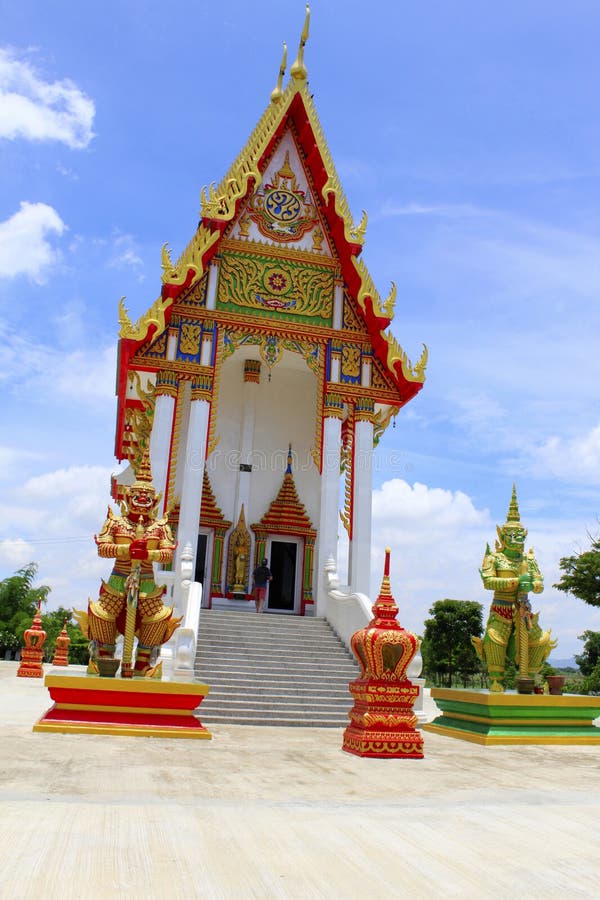 Front View of the Red and White Temple with the Guards and Steps ...
