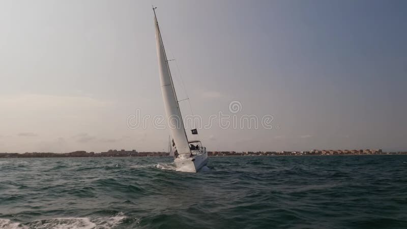 Front View of Sailboat Sailing in Slow Motion Over the City Stock ...