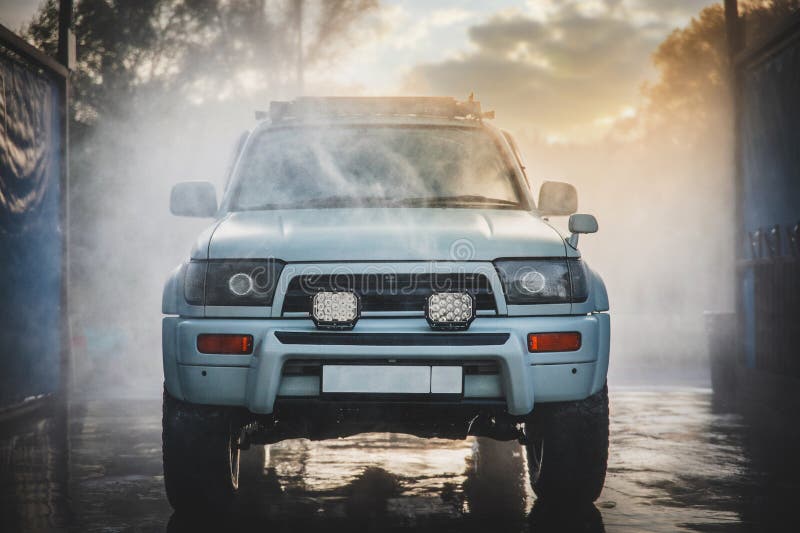 Front View of Self-service Car Wash with Box in Which the White Car are ...