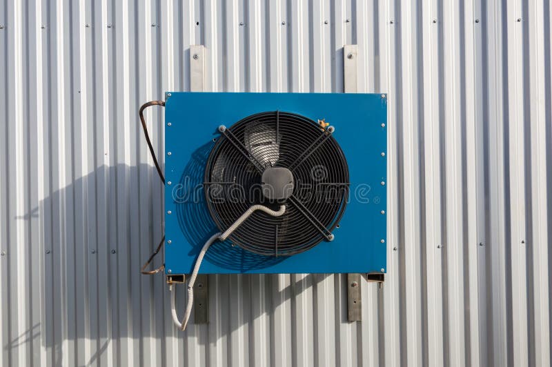 Front View of the Small Blue Industrial Cooling Unit Installed on the ...