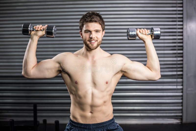 Front View of Smiling Man Lifting Weight Stock Photo - Image of active ...