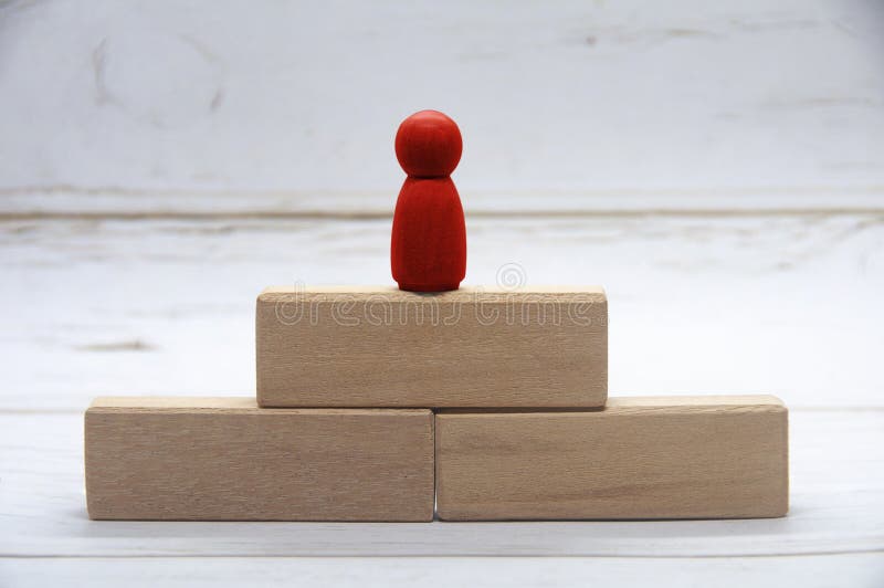 Front View of Stacking Wooden Blocks with Red Figure on Top ...