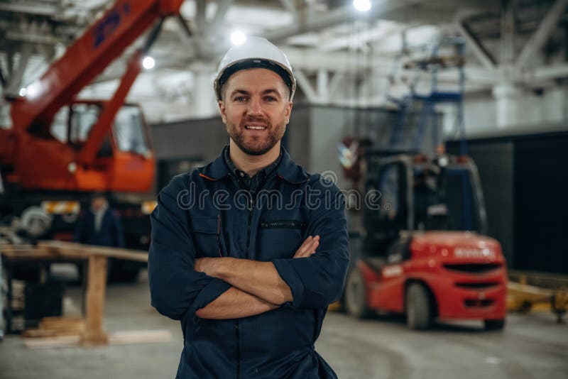 Front View, Standing. Male Worker is in the Modern Warehouse or ...