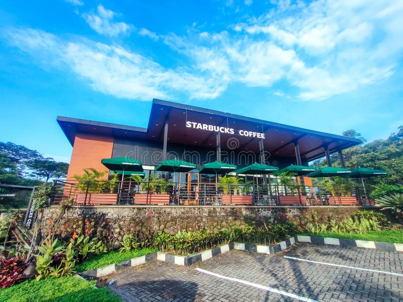 Front View of Starbucks with an Environmentally Integrated Design ...