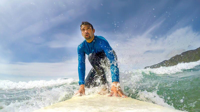 Front View of a Surfer Riding a Small Wave Stock Photo - Image of ...