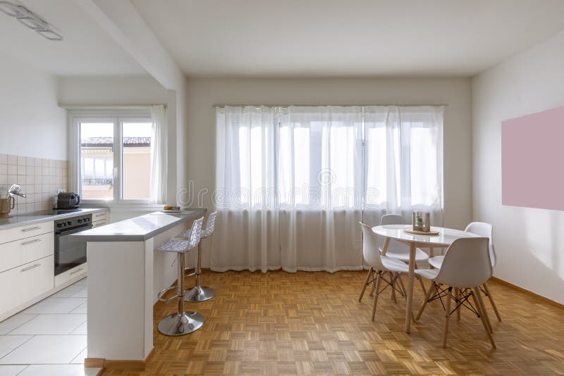 Front View with a Table and Four Chairs with a Hanging Picture, Kitchen ...