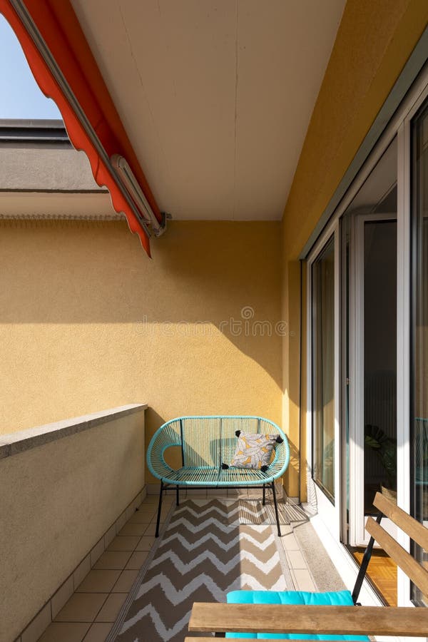 Front View Terrace with Small Outdoor Sofa on a Nice Sunny Day Stock ...