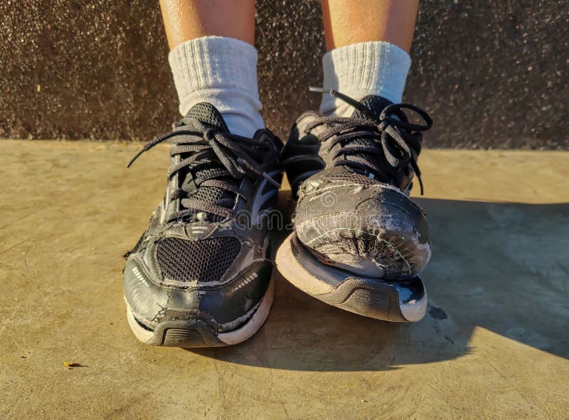 Front View of Torn Shoes, Shoes in Need of Repair Stock Image - Image ...