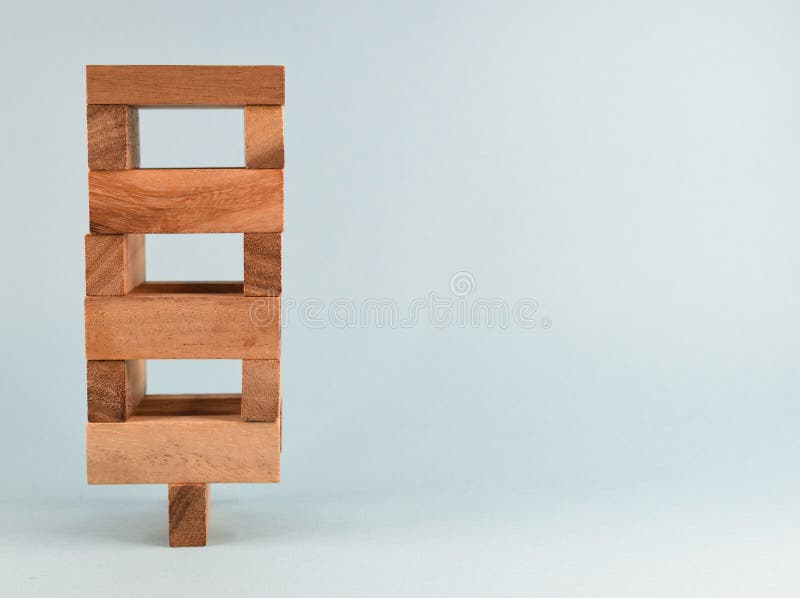 A Front View on a Tower Built from Wooden Blocks and Based on a Single ...