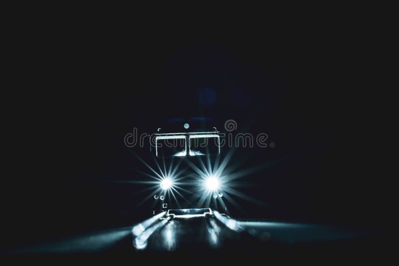 Front View of a Train with Glaring Lights Moving Forward Stock Photo ...