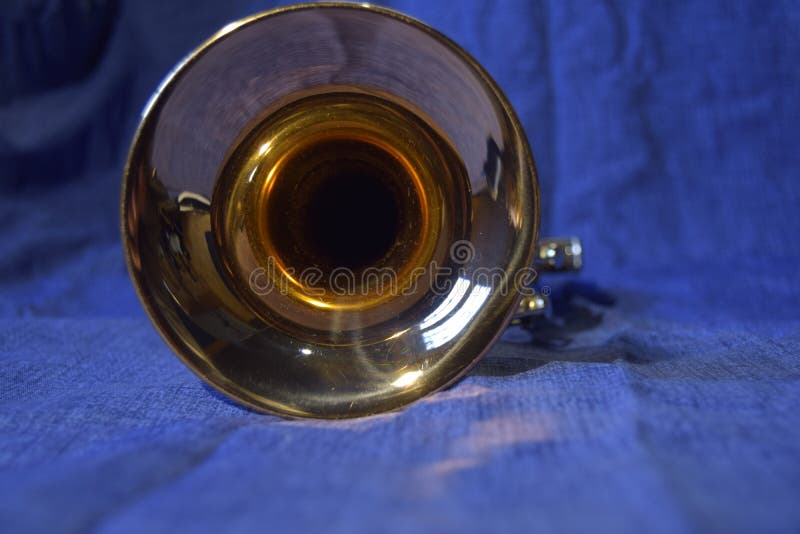 FRONT VIEW TRUMPET on BLUE FABRIC BACKGROUND Stock Image - Image of ...