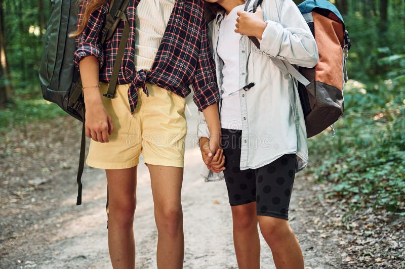 Front View. Two Girls is in the Forest Having a Leisure Activity ...