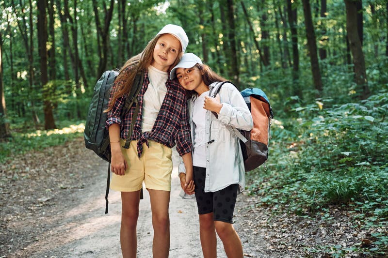 Front View. Two Girls is in the Forest Having a Leisure Activity ...