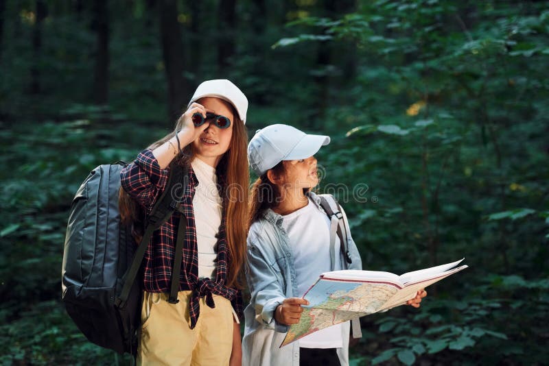 Front View Of Two Girls That Is In The Forest Having A Leisure Activity Stock Image Image Of