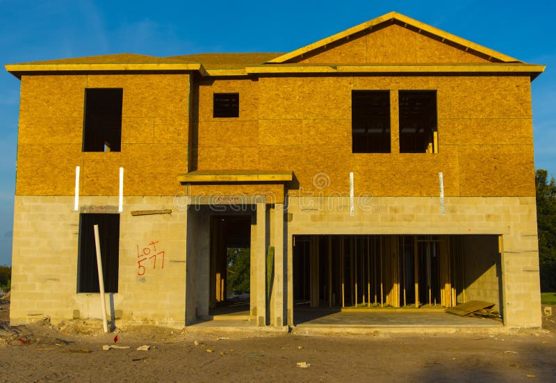 Front View of a Two-story Building in the Process of Being Constructed ...